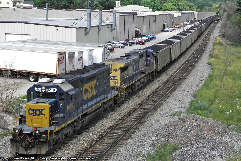 Coke - no Pepsi - with an Sd40-3 on the point, roll